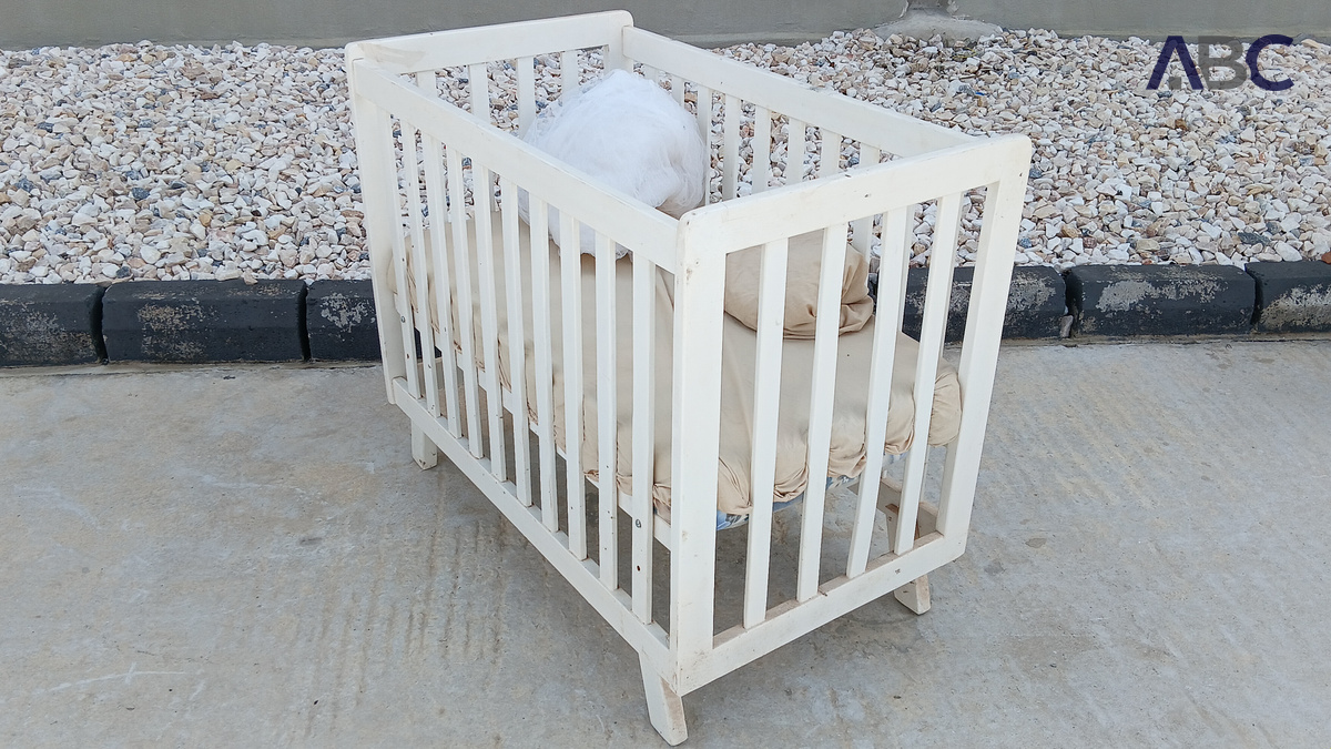 Charming White Wooden Baby Crib